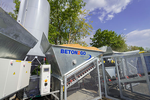 Bulk material dispenser - Concretedrive-thru
